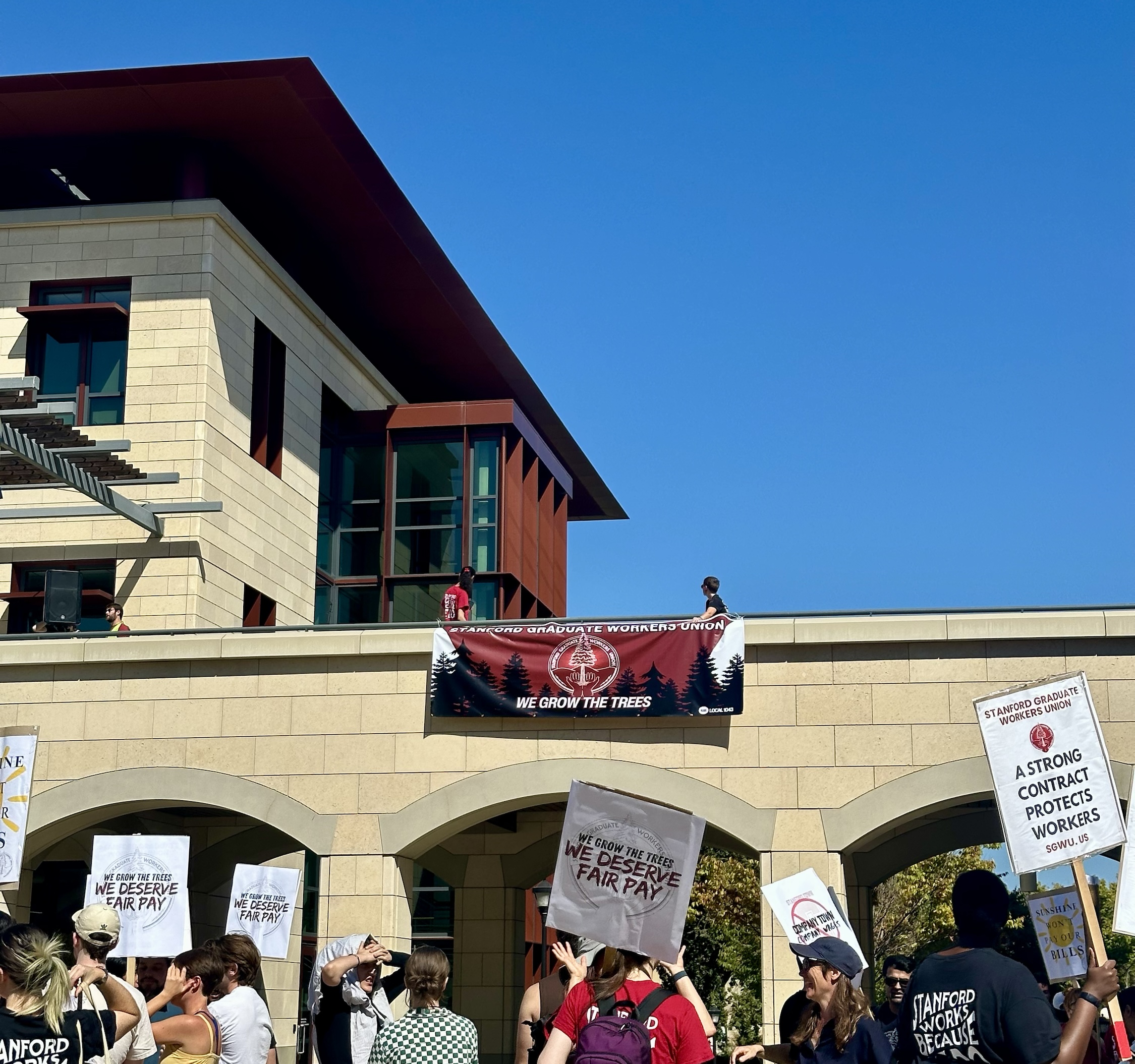 Hundreds of graduate workers rally, pledge to strike